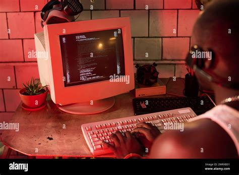 Selective Focus Over Shoulder Shot Of Unrecognizable Black Man Hacking