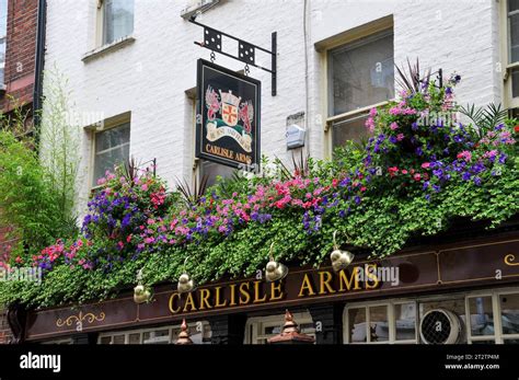 London Uk July Above The Entrance Of A Classic English Pub