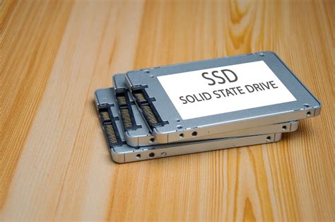 Premium Photo SSD Disk Drive Placed On Wooden Surface High Speed SSD SSD Sata Port