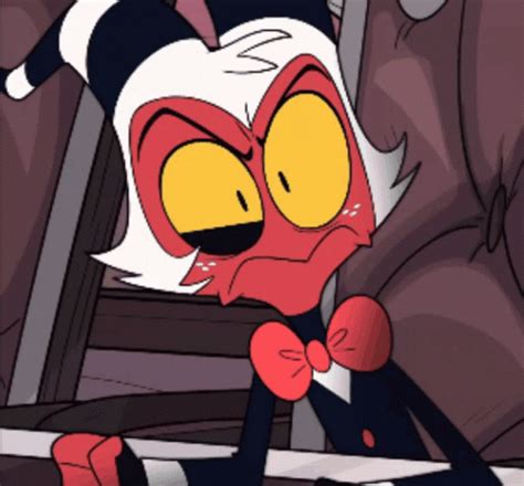 An Animated Character With Yellow Eyes And Black Hair Wearing A Red Bow Tie Sitting In A Chair