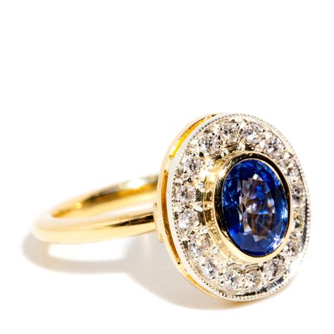 Reinvented Vintage Circa 1980s Sapphire And Diamond Halo Ring 18 Carat