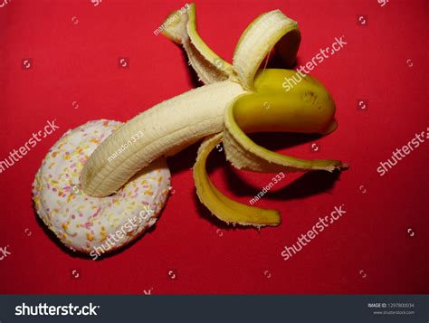 Red Donut Reap Yellow Banana Isolated Stock Photo 1297800034 Shutterstock