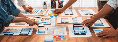 Premium Photo Panorama Shot Of Frontend Developer Team Brainstorming Ui And Ux Designs For