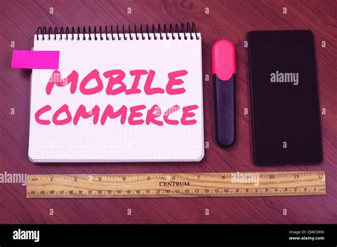 Text Caption Presenting Mobile Commerceusing Mobile Phone To Conduct Commercial Transactions