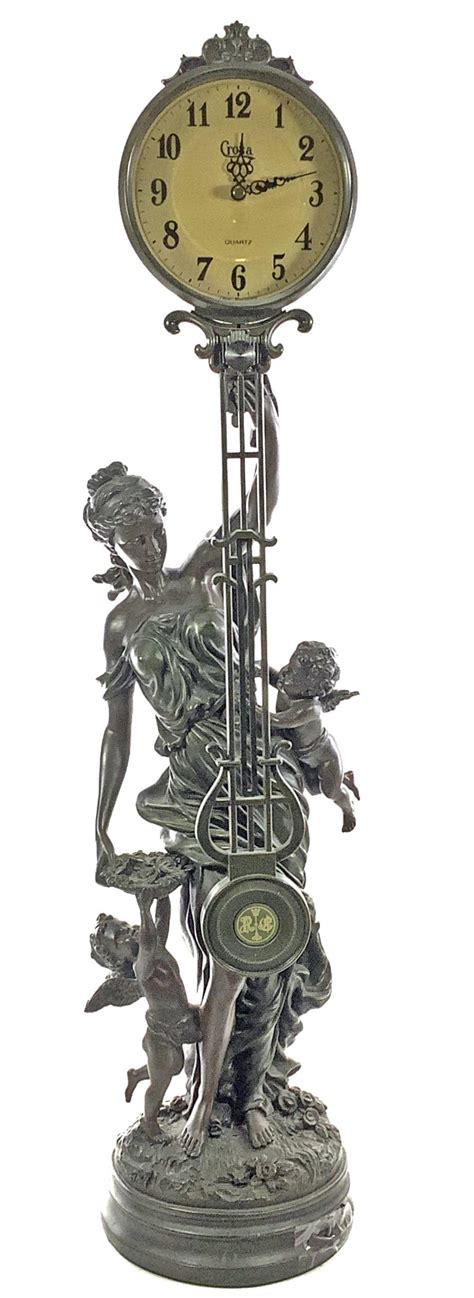 Lot Crosa Quartz Swinging Pendulum Figural Clock