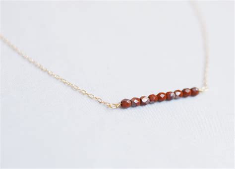 prelude metallic auburn microbeads on gold plated chain 18 00 via