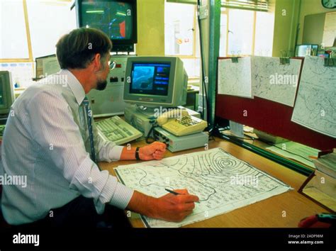 Weather Forecasting Meteorologist Compiling A Weather Chart Also Known