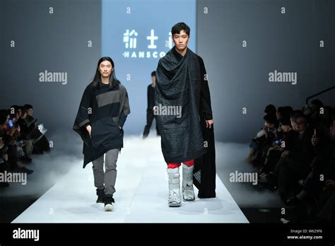 A Model Displays A New Creation At The Fashion Show Of Hanscool By Yu