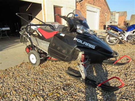 2006 Polaris Rmk 600 Bred Over Kit To 727 Starts Supper Easy Has 2873 Miles Cart And Cover