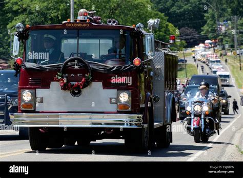 A Saxonburg Pa Fire Truck Carrying The Casket Of Fireman Cory