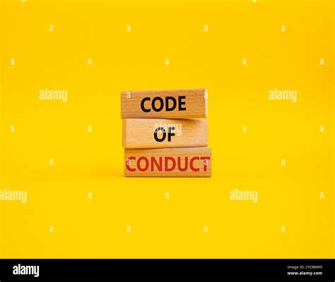Code Of Conduct Symbol Wooden Blocks With Words Code Of Conduct Beautiful Yellow Background