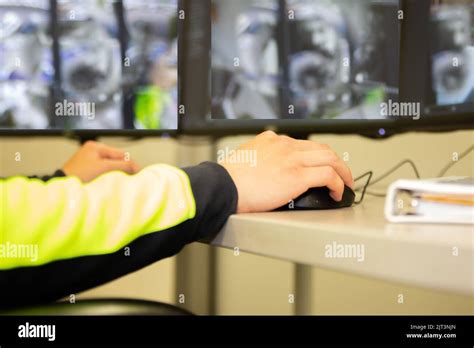 The Male Hand Clicking The Mouse While Doing Security Monitoring Close Up Stock Photo Alamy