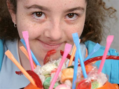 Girl Smiling At Candy Closeup Stock Image Image Of Orange Happy 124367