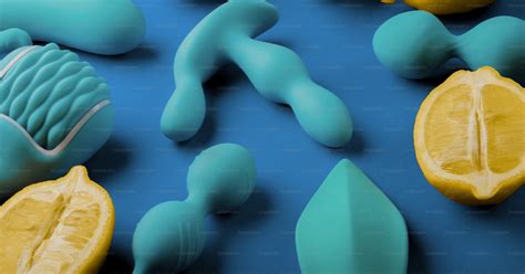 A Close Up Of A Blue And Yellow Object On A Blue Surface Photo Sex Image On Unsplash