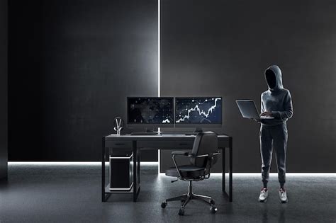 Premium Photo Hacker Using Laptop In Modern Concrete Office Interior
