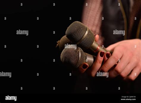 Girl Holding Dirty Microphone Stock Photo Alamy