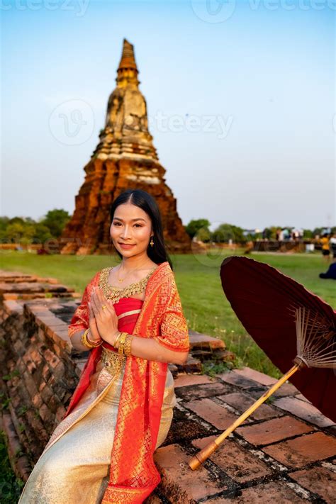 Beautiful Thai Girl In Traditional Dress Costume Red Umbrella As Thai
