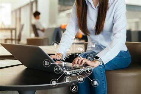 Premium Photo Women Are Using Laptop Wifi Connection On The Desk With A Cup Of Coffee In The