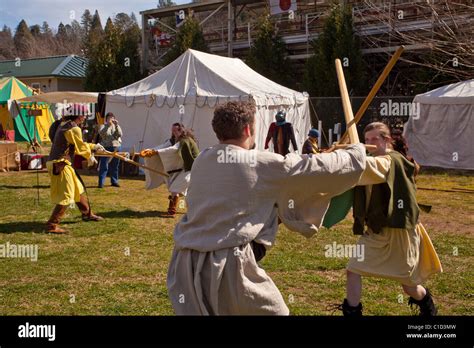 Burly Men Demonstrating Their Sword Fighting Technique At The Sonora