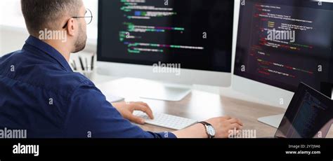 Programmer Working At Desk In Office Back View Banner Design Stock Photo Alamy