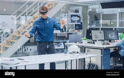 Engineering Software Developer Wearing Virtual Reality Headset Uses Gestures To Interact With