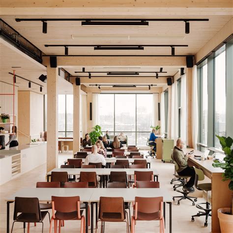 Curved Panels Of Green Timber Clad Office In Norway By Oslotre