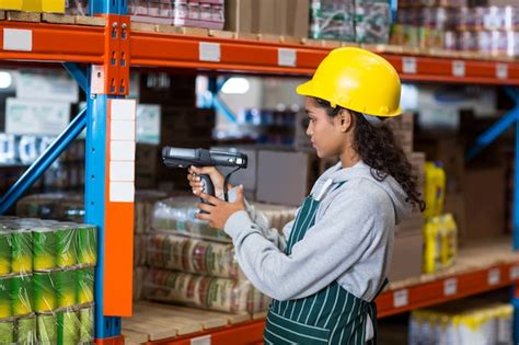 Premium Photo Female Worker Using Barcode Scanner