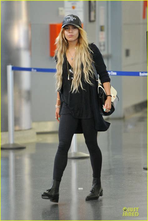 Vanessa Hudgens Sunglasses Make Her Look Red Hot At Lax Airport