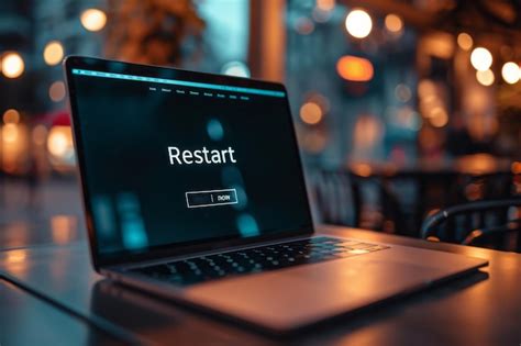 laptop displaying restart message premium ai generated image