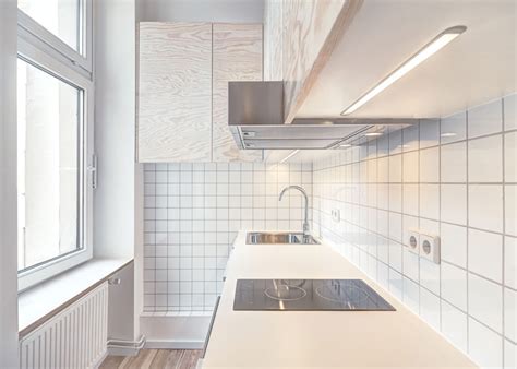 Pale Utility Unit Supports Mezzanine In A Berlin Micro Apartment