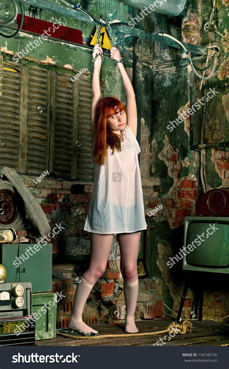 Girl Chained To Wall