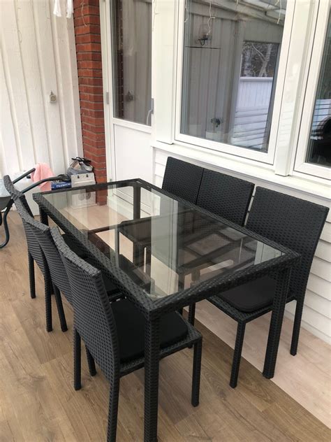 Utemöbelset Med Glasbord Och Sex Stolar I Svart Rotting Blocket