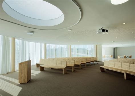 Plan 01s Crematorium Is Covered In Ribbed Concrete And Glass