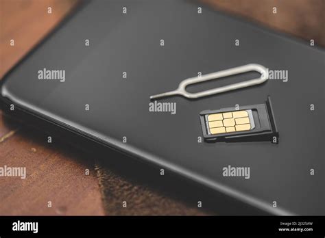 SIM Card For Smart Phone Changing The SIM Card Stock Photo Alamy