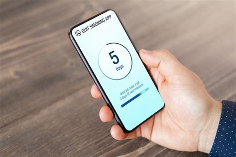 Premium Photo Man Using Mobile App To Track And Quit His Smoking Habit