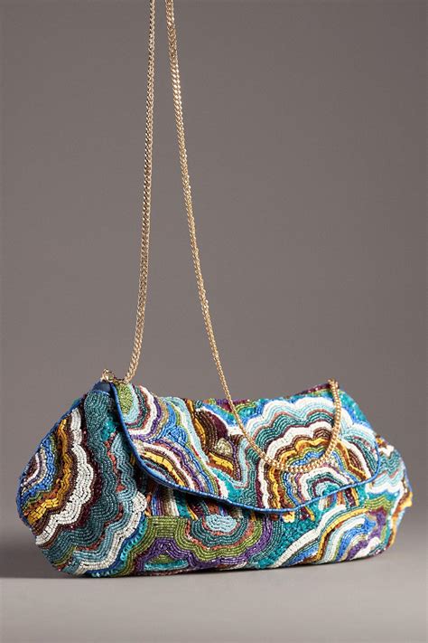 비즈 폴드오버 클러치 앤트로폴로지 한국 공식 스토어 유니크한 여성 패션 및 라이프스타일 편집샵 200개이상의 프리미엄