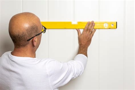 Premium Photo Photographs Of A Man Over 50 With Construction Tools