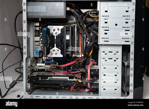 The System Unit Of The Computer Is Disassembled Without A Cover Lots Of Old Computer Parts