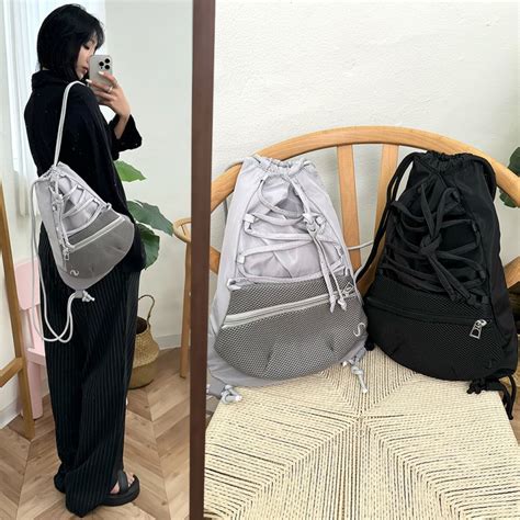 늘품 캐주얼 편한 멜포스트링백팩 2color 나일론 고프코어 스트링 메쉬 캐주얼