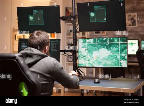 Back View Of Caucasian Man Stealing Personal Data From People Around The World Dangerous Hacker