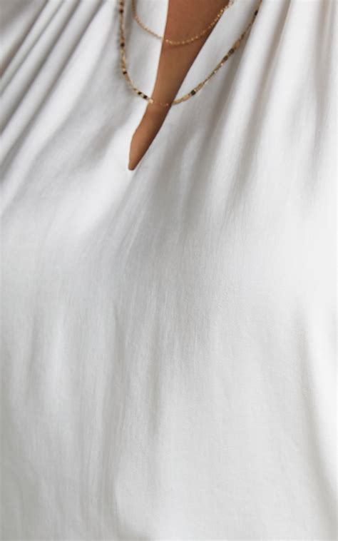 Demmi Key Hole Flutter Sleeve Top In White Showpo