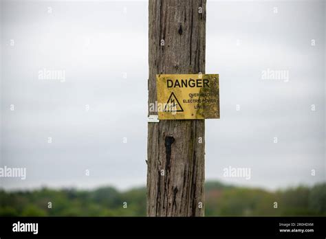 Danger Overhead Electric Power Line Stock Photo Alamy