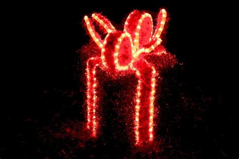 Premium Photo Illuminated Text Against Black Background