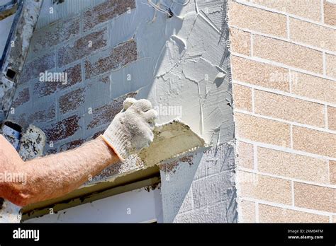 Facade Cladding With Flexible Thin Brick Veneer Panel Reinforced With
