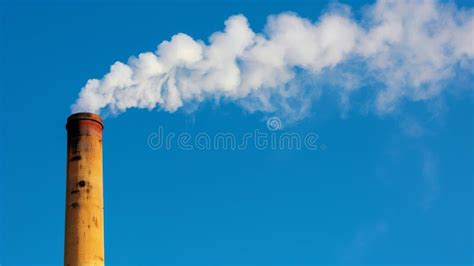 Factory Emitting Smoke And Pollution Contributing To Environmental