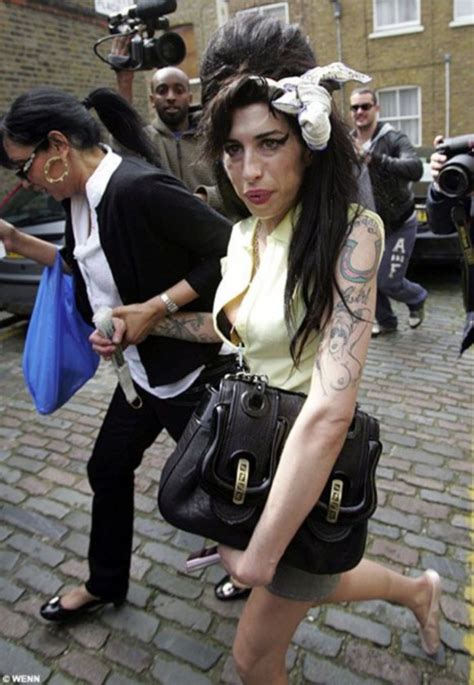 Amy Winehouse In Tears As She Is Arrested Over Pub Assualt Claims
