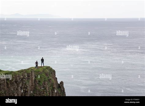 Uk Northern Ireland County Antrim People On Rock Cliff At Causeway