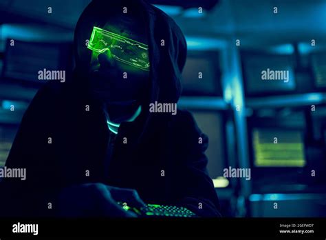 cyber hacker breaks into databases to obtain information using a