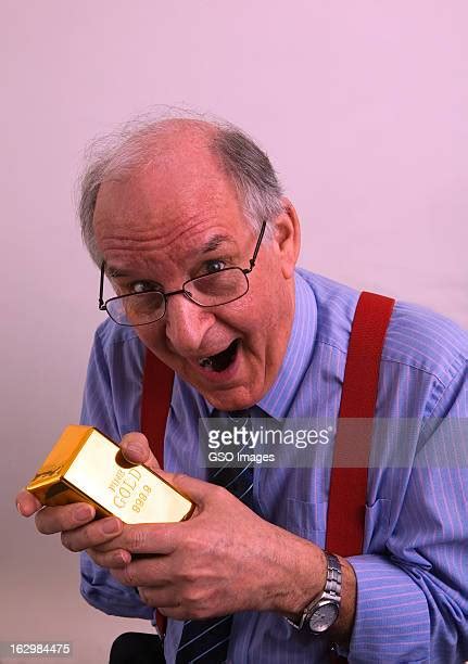 Man Wearing Gold Glasses Photos And Premium High Res Pictures Getty