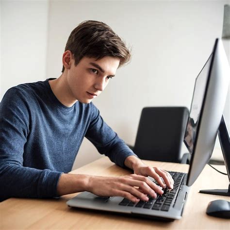 Premium Photo A Person In Front Of Computer Working Html